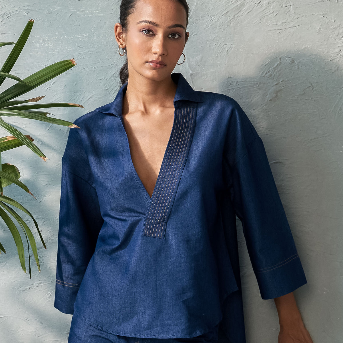 Elegant Single Placket U-Hem Top with Deep Neckline | Stylish Layering ...